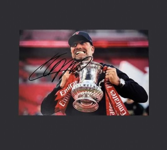 Jurgen Klopp's Liverpool Signed Picture - CharityStars Jurgen Klopp's Liverpool Signed Picture - CharityStars